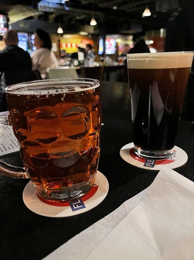 Two glasses of liquid poetry—amber London Pride and velvety Guinness. A special relationship between nations, represented in perfectly poured pints.
