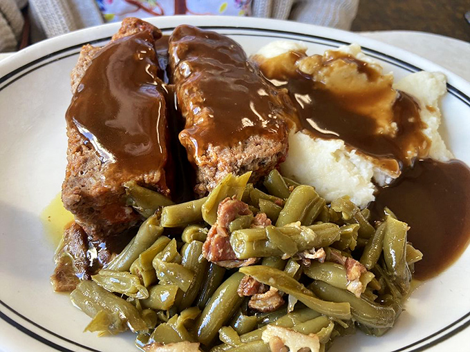 Meatloaf dinner with all the fixings—the kind of plate that makes you wonder why you ever bothered with nouvelle cuisine or small portions.