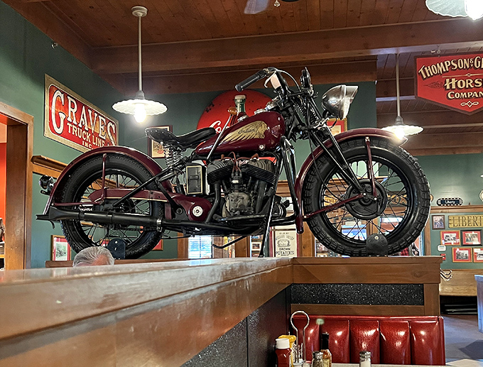 Vintage motorcycle decor adds character without trying too hard—like that cool uncle who never talks about how cool he is but everyone knows anyway.