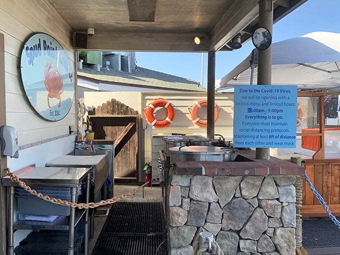 The outdoor kitchen setup – where function trumps form and the focus remains squarely on serving exceptional seafood.