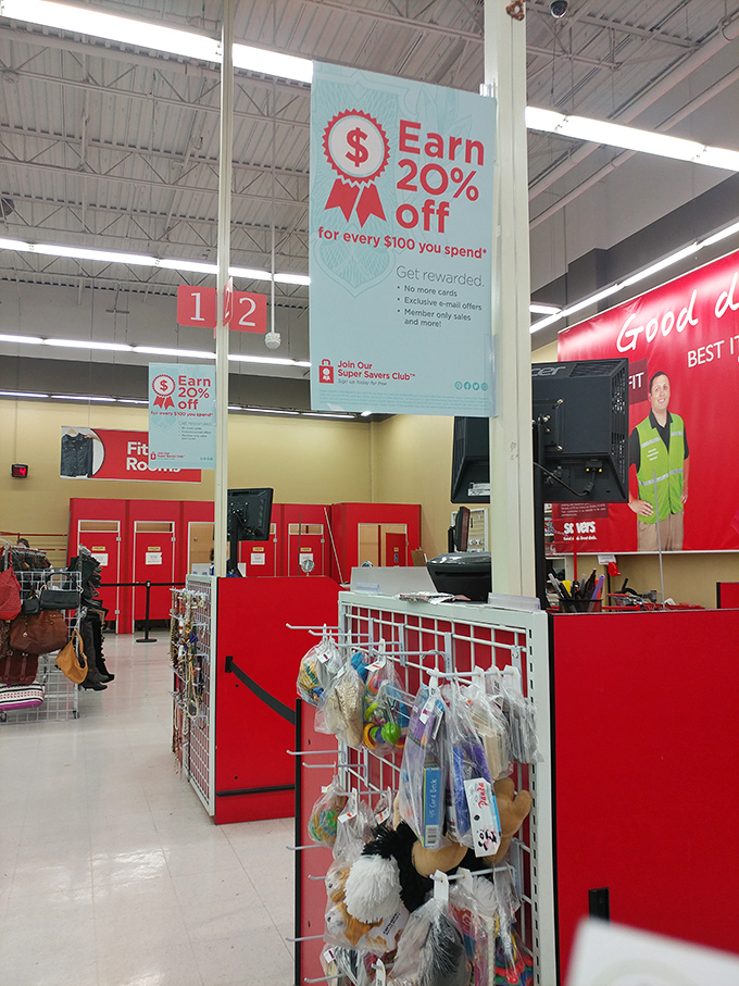 Signs advertise the Super Savers Club – because the only thing better than thrift store prices is thrift store prices with a discount.