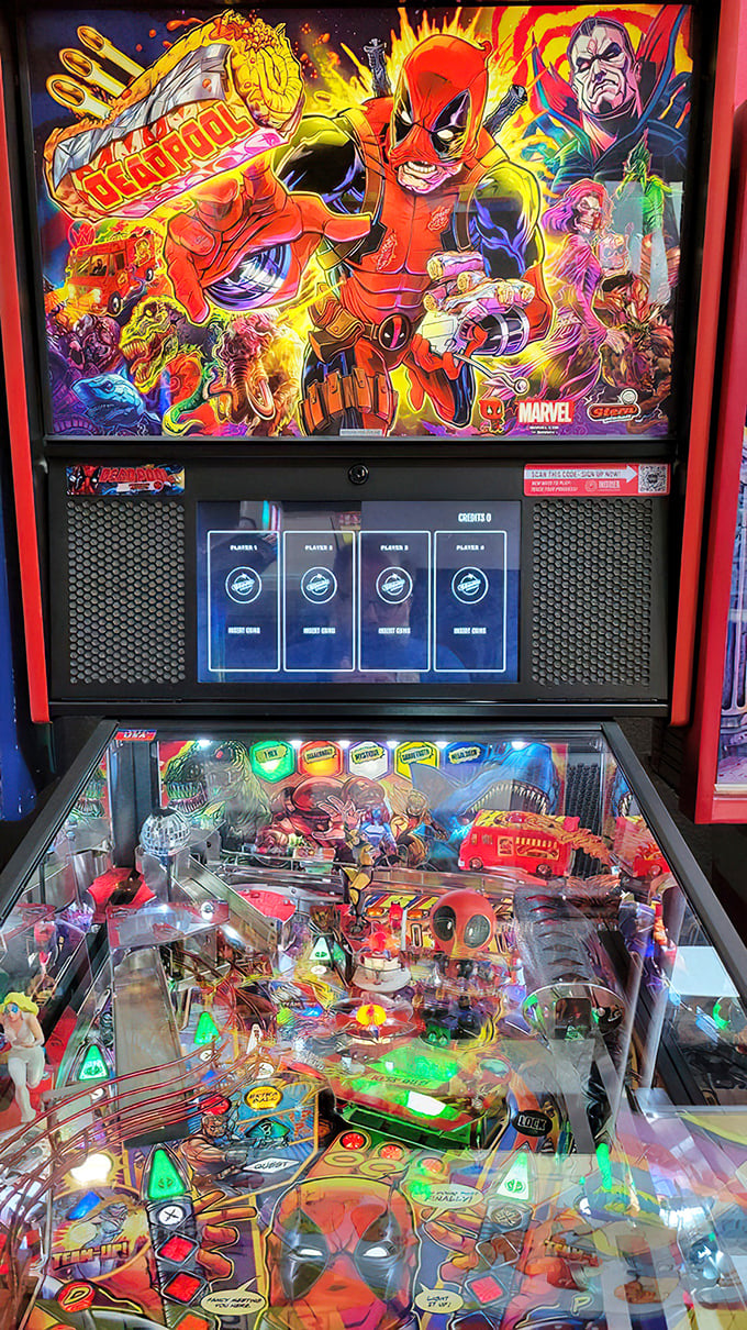 Deadpool's colorful cabinet promises mayhem and merriment. The detail in these modern machines would make Stan Lee weep with joy.