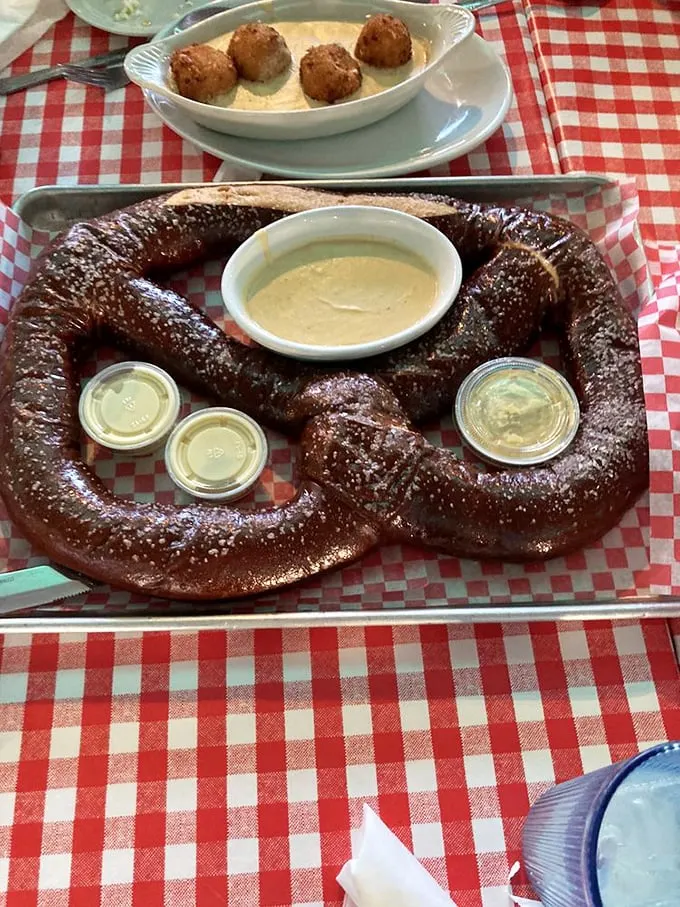 This pretzel isn't just big—it's Midwestern hospitality in carb form. Soft, salty perfection that makes sharing both necessary and slightly disappointing.