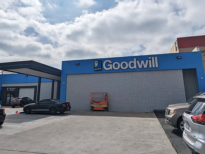 Goodwill's bold blue building stands out against the LA skyline like a superhero headquarters for bargain fighters.