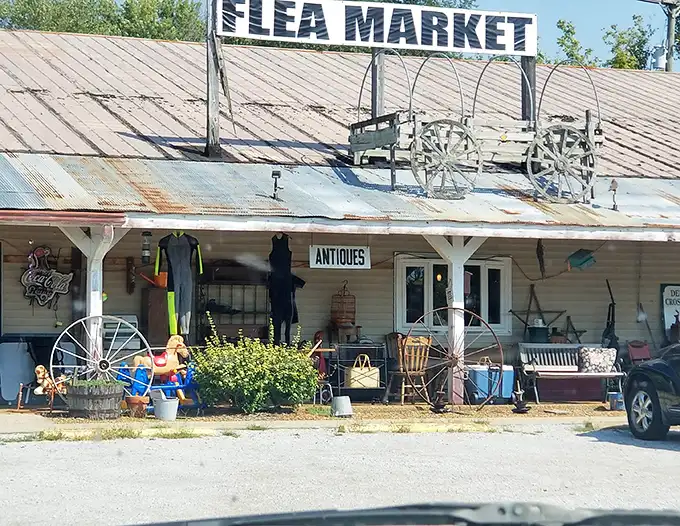 Wagon wheels and weathered wood—Homestead Flea Market wears its rural heritage like a well-earned badge of honor.