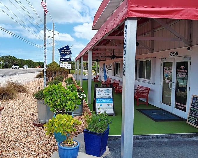 Those colorful chairs aren't just for sitting – they're front-row seats to the best seafood show in the Keys.
