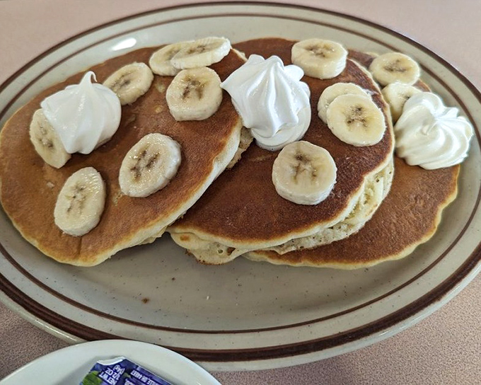Banana pancakes that make you wonder why anyone would ever settle for cereal again—sweet, fluffy, and utterly irresistible.