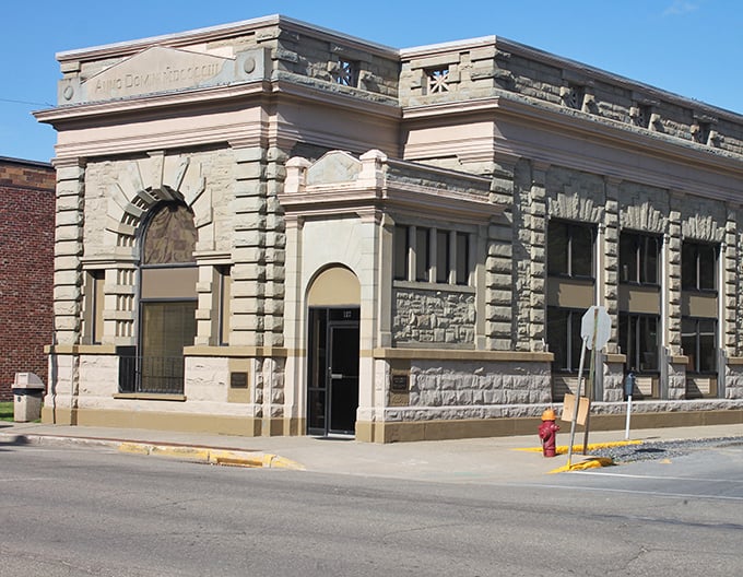 This stone bank building exudes permanence and stability. When they built financial institutions in the early 1900s, they meant business – architecturally speaking.