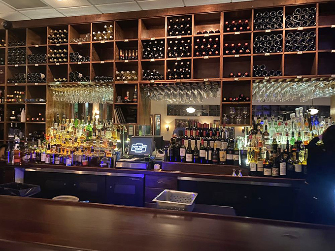 The bar at New York Prime doesn't just stock bottles—it showcases them like trophies, each one promising a different path to evening perfection.