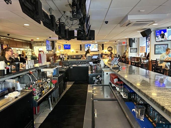The bar stands ready for thirsty travelers—a modern-day canteen where historical discussions and sports debates unfold with equal passion.