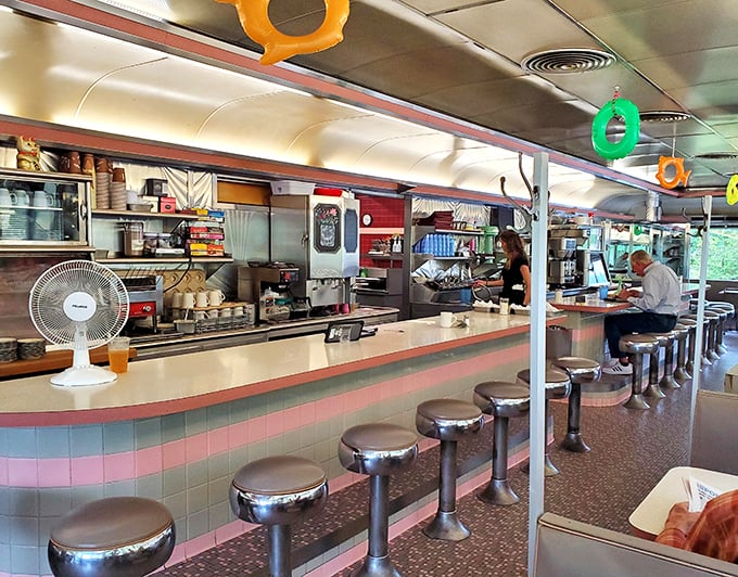 The heartbeat of any great diner – the counter where you can watch your breakfast being born while trading friendly banter.