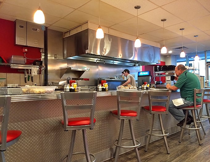 Counter seating offers front-row tickets to the breakfast theater – where skilled short-order choreography turns raw ingredients into morning masterpieces.