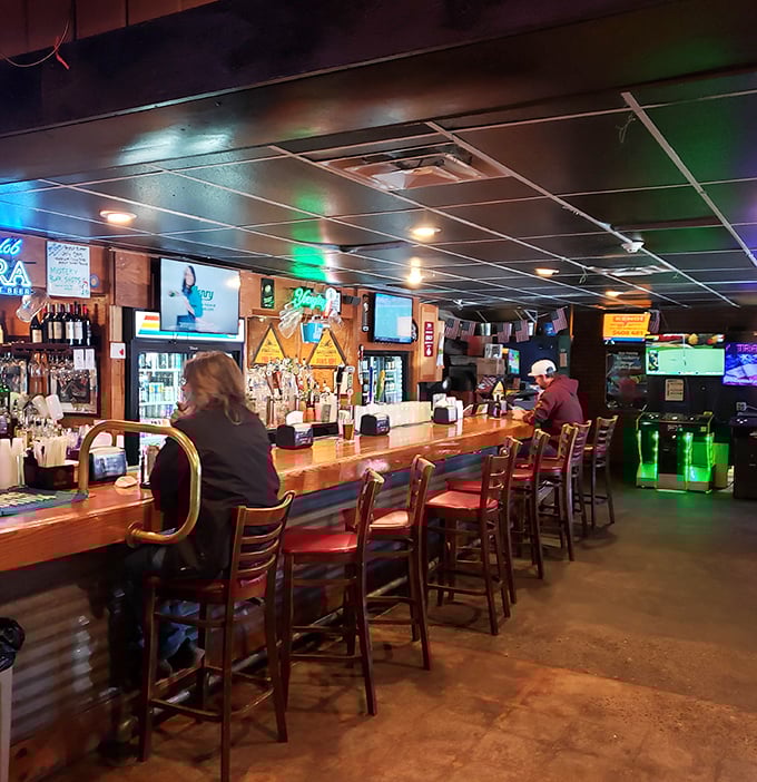 The bar at Johnny B's isn't just serving drinks—it's hosting a community gathering where strangers become friends over cold beverages and shared stories.