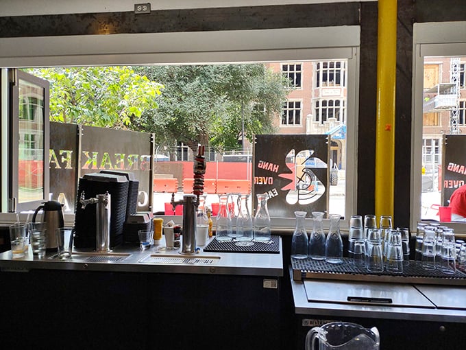 The bar counter view—where breakfast meets beverages in perfect harmony. Morning mixology happens here, one coffee or mimosa at a time.