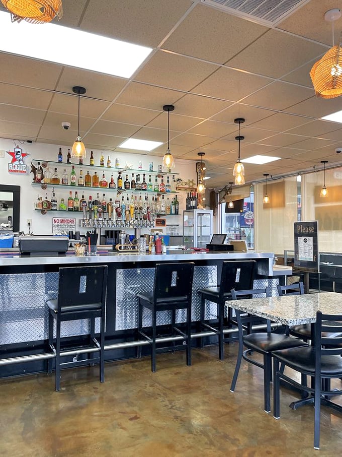 A bar that means business, with comfortable seating and a selection that says, "Yes, we take our drinks as seriously as our seafood."