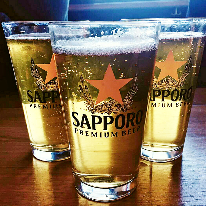 Sapporo isn't just beer—it's liquid sunshine in glassware. Those golden bubbles are the perfect counterpoint to Humble Potato's umami-rich menu items.
