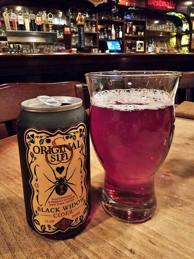 Black Widow cider—deceptively beautiful and dangerously drinkable. The ruby color hints at the flavor adventure awaiting your first sip.