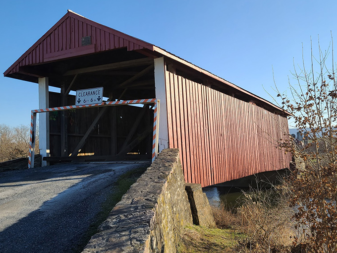 This covered bridge doesn't just span a creek—it bridges centuries of Pennsylvania history. Horse-drawn buggies crossed here long before your Prius.