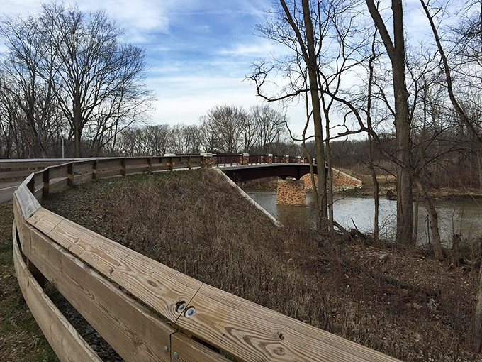 This wooden bridge doesn't just connect two shores—it links present-day wanderers to generations of travelers who came before.