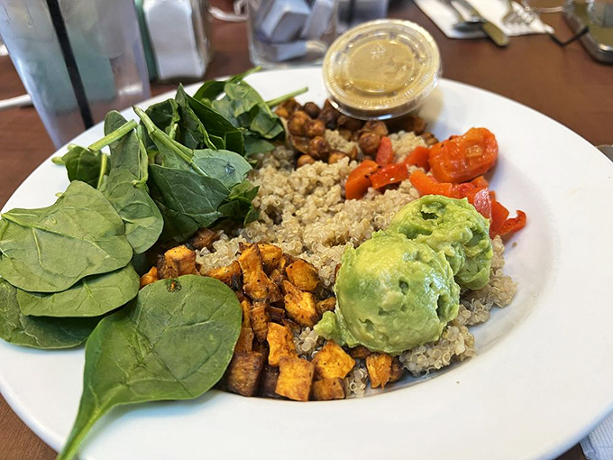 A Buddha Bowl that achieves the impossible—making healthy eating feel like an indulgence. That avocado scoop is nature's butter, only better.