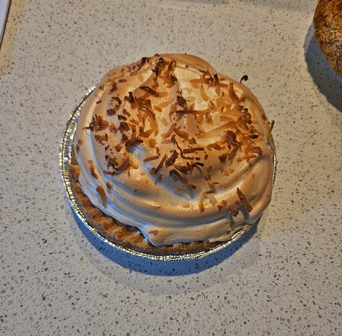 Coconut cream pie with perfectly toasted flakes—tropical vacation vibes without the sunburn or overpriced resort drinks.