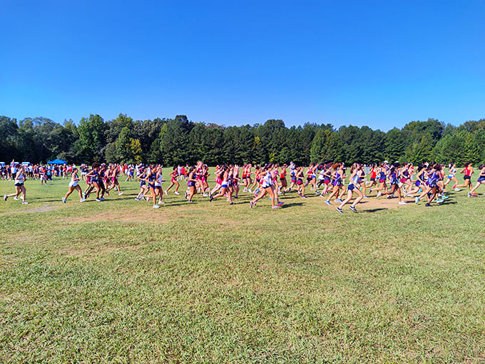 The starting line of what appears to be the world's most enthusiastic community run. In Conyers, even exercise comes with a side of neighborly connection.