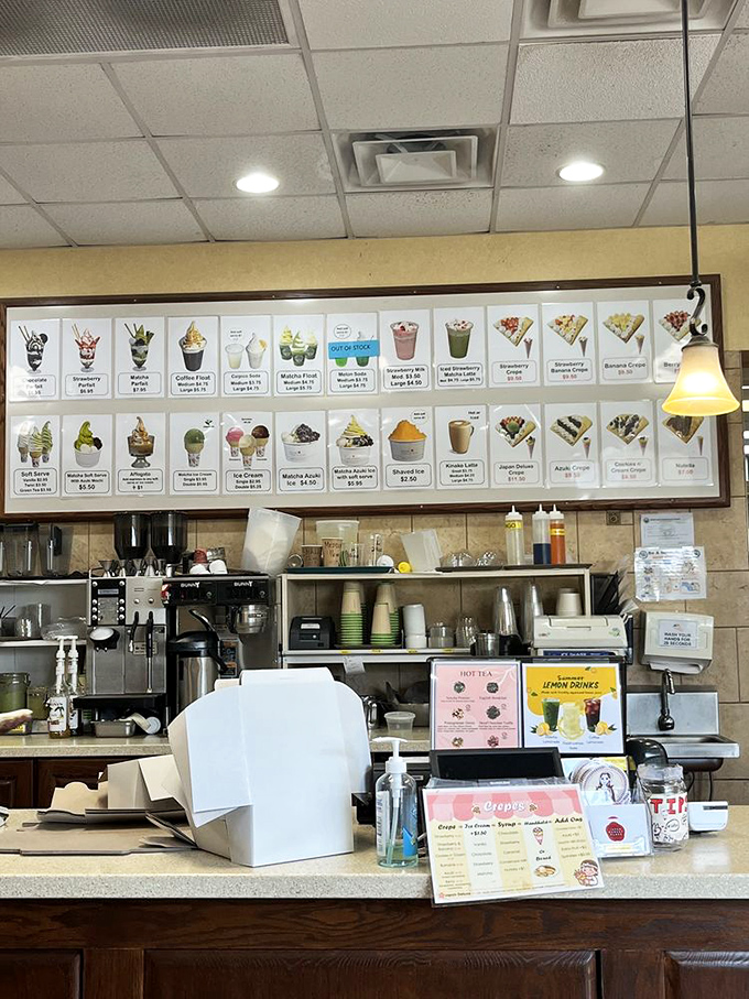 Dessert mission control—where dreams are displayed and decisions are impossible. The menu board isn't just offering treats; it's offering transportation to flavor paradise.