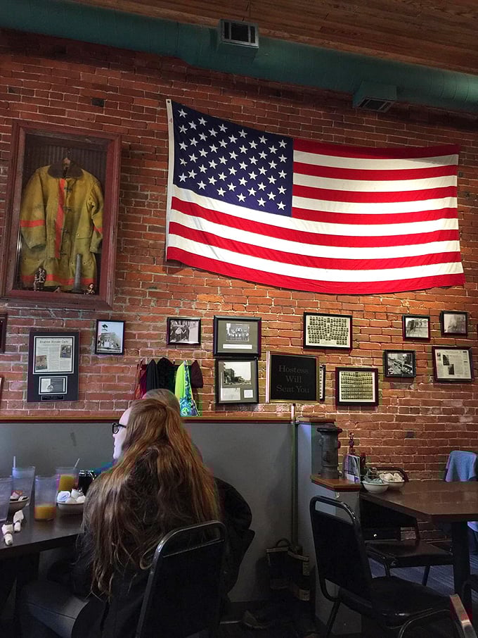A firefighter's jacket watches over diners like a guardian angel of good taste. The American flag reminds us that breakfast is patriotic duty.