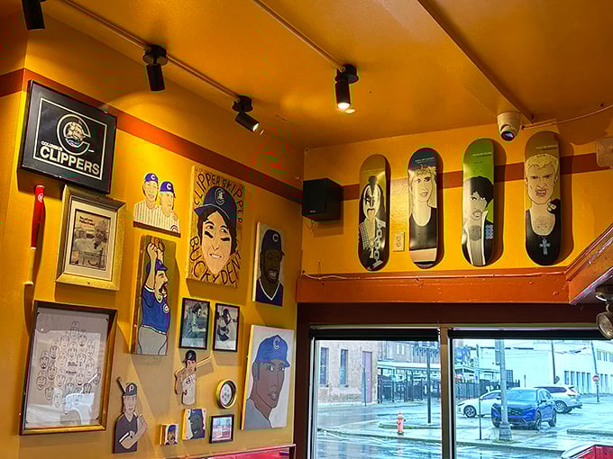 Baseball memorabilia and skateboard decks adorn the walls – because nothing pairs with a gourmet hot dog quite like American nostalgia.