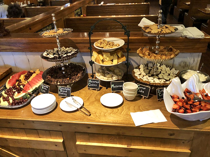 Dessert display that's basically an adult version of a candy store. The kind of spread that makes you wish you'd skipped the entrée.