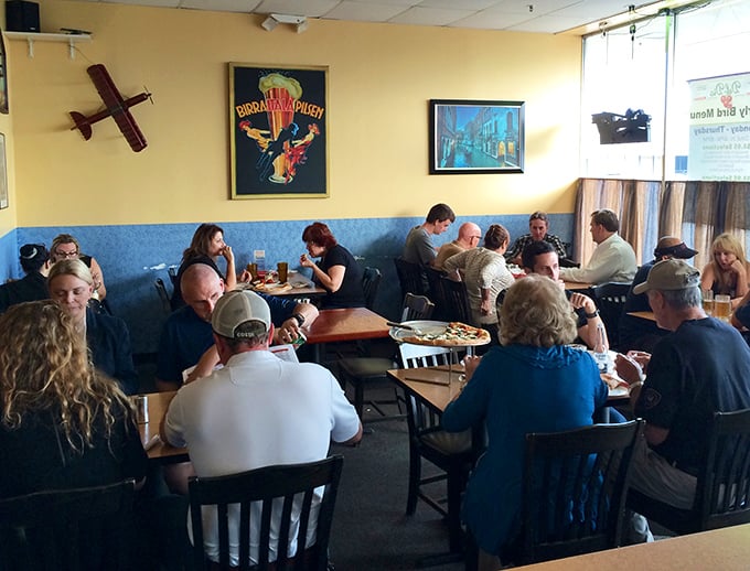 A dining room filled with locals who know the secret. These aren't tourists—these are the regulars who've been keeping this place humming.