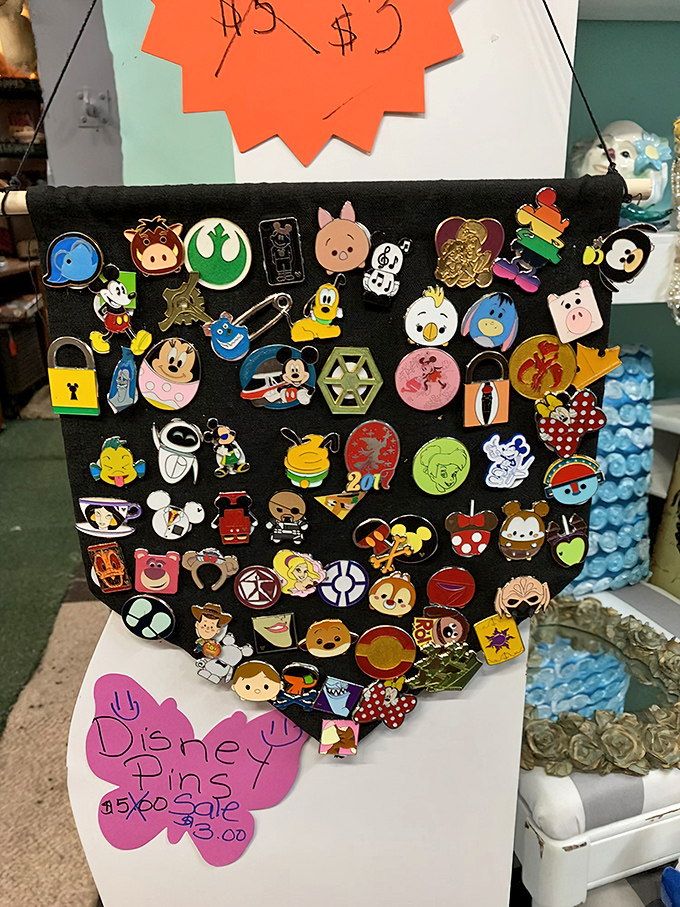 Disney pin trading heaven! Each tiny character represents someone's collection, memory, or childhood dream—all waiting for their next adventure.