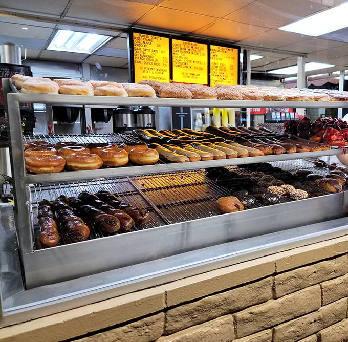 Three tiers of temptation await customers who must make the impossible choice of which donut deserves to come home with them.