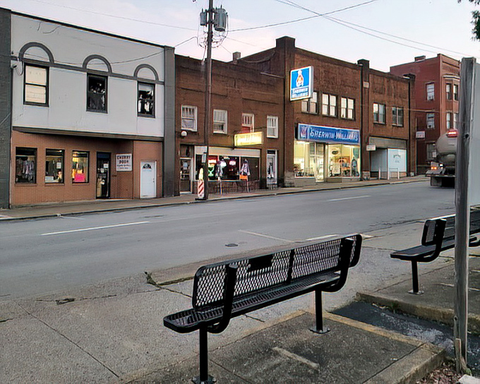 Evening settles on Waynesburg's storefronts, where window displays glow with invitation. Small-town nightlife has its own special rhythm.