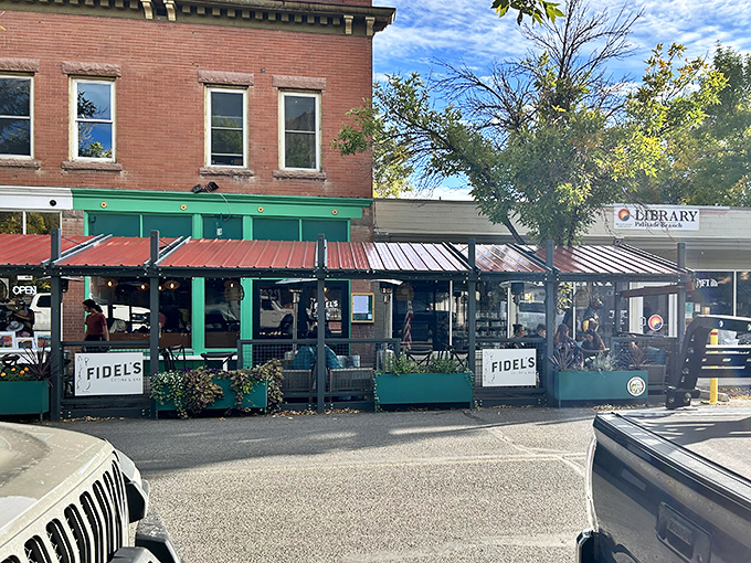Fidel's Cocina & Bar's inviting patio beckons with the promise of margaritas and mountain views after a day of fruit-picking adventures.