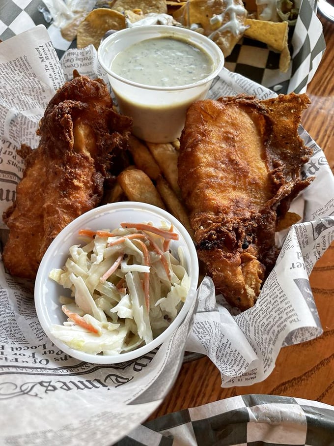 Fish and chips that would make a British pub regular nod in approval—crispy exterior giving way to flaky fish that tastes like it just met the fryer.