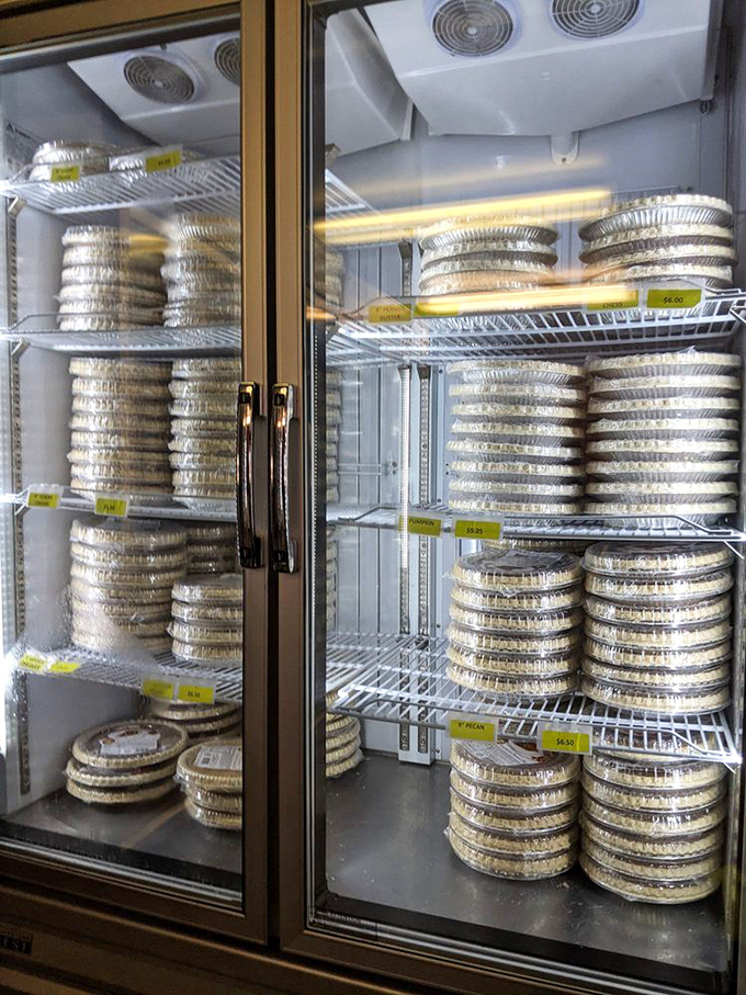 The refrigerator of dreams – stacked with pie tins like gold bars at a bank. Never has cold storage looked so warmly inviting.