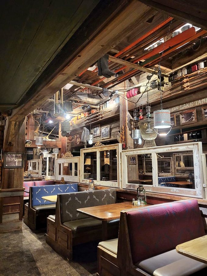 Booth seating that feels like you've wandered into someone's very cool fishing cabin. Those hanging lights weren't designed—they evolved.