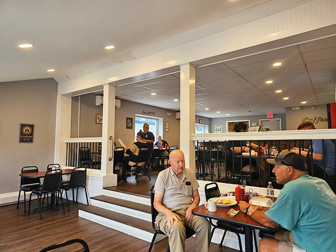 The elevated dining area creates a breakfast theater where regulars become the stars of their own morning show.
