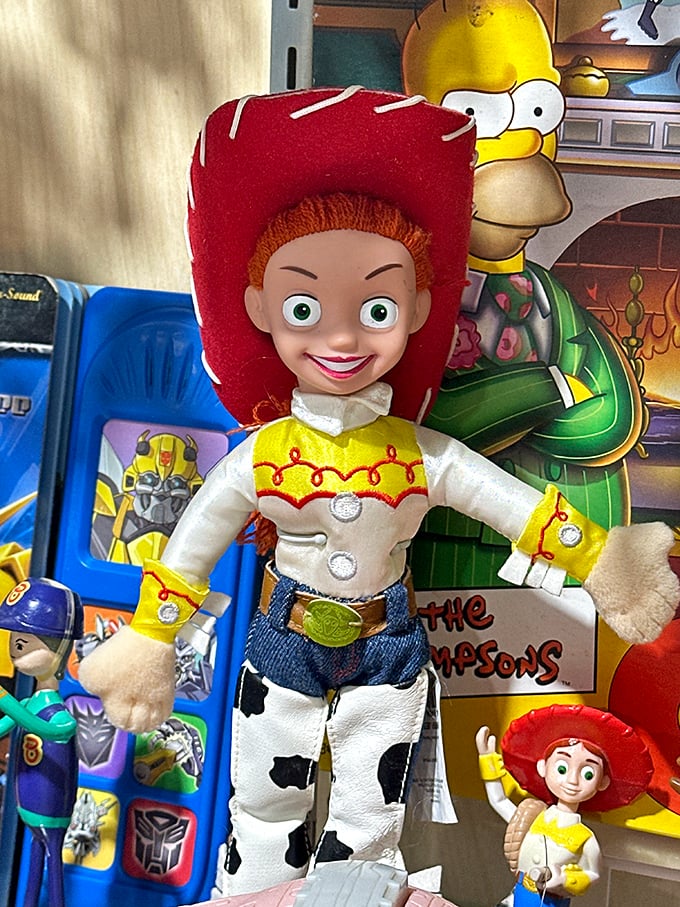 Howdy partner! Jessie from Toy Story stands at attention. Disney and Pixar characters wait patiently behind glass, ready to trigger avalanches of childhood memories.