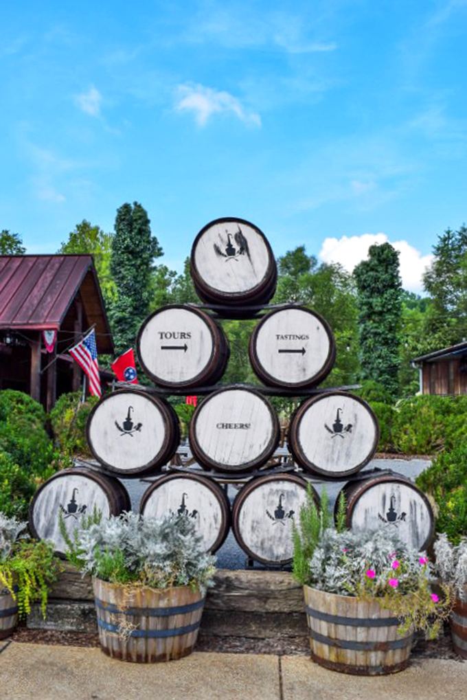 Whiskey wisdom stacked high – these barrels aren't just aging spirits, they're perfecting them in Tennessee's gentle embrace.