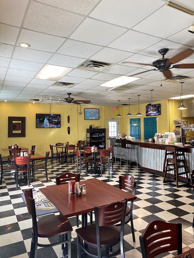 The checkered floor and wooden tables create that timeless diner aesthetic where memories are made between bites of comfort food.