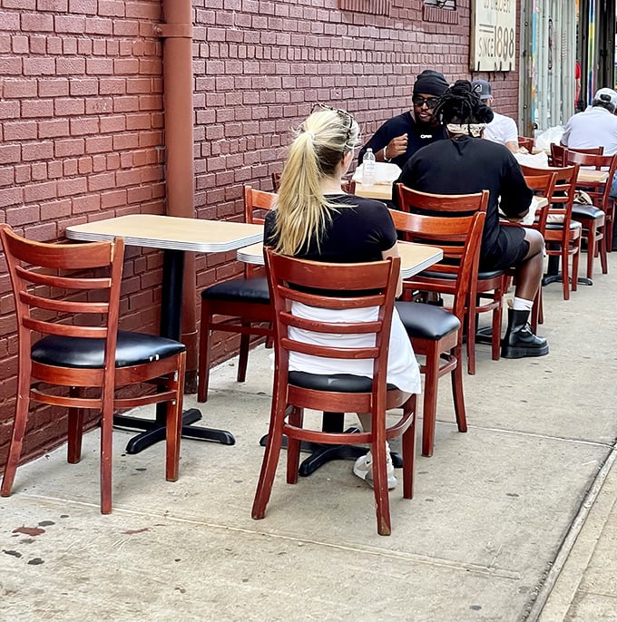 Sidewalk dining at Katz's – where you can people-watch while your sandwich watches you, wondering if you're worthy of its deliciousness.