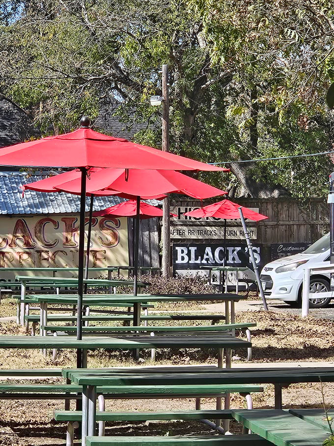 Al fresco dining, Texas-style. Those red umbrellas provide shade for serious contemplation of life's important questions, like "Should I order seconds?"