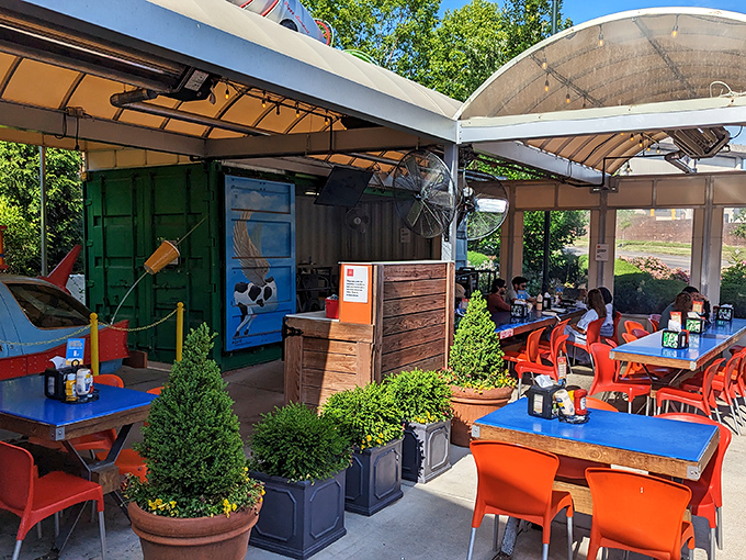 Al fresco dining with a side of whimsy. The colorful outdoor seating area, built from repurposed shipping containers, is urban renewal at its most delicious.
