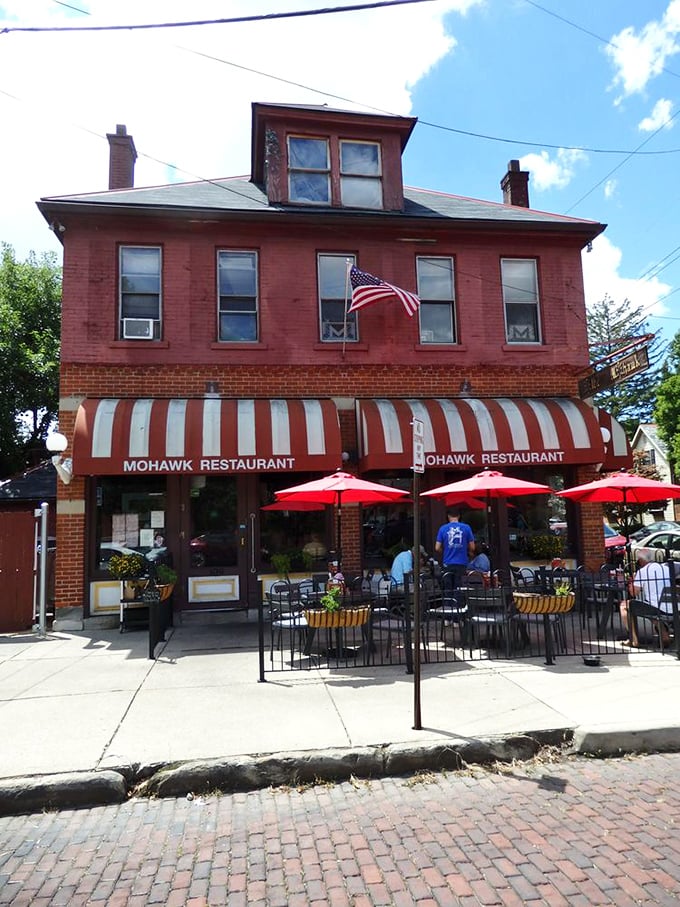 Summer in German Village means sidewalk dining under those signature red umbrellas. The brick streets below are almost as old as the recipes inside.