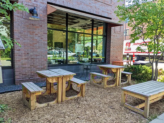 Rustic outdoor seating where you can commune with both nature and carbs—the perfect compromise for indecisive dining companions.