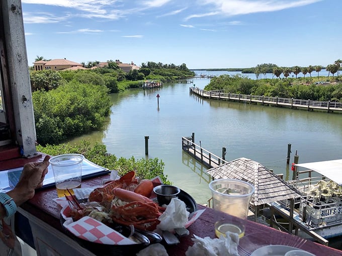Waterfront dining with stone crabs and a cold drink—this isn't just lunch, it's the reason people move to Florida in the first place.