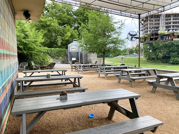 The patio offers a breath of fresh air between bites. These picnic tables have witnessed countless first dates, celebrations, and food comas.