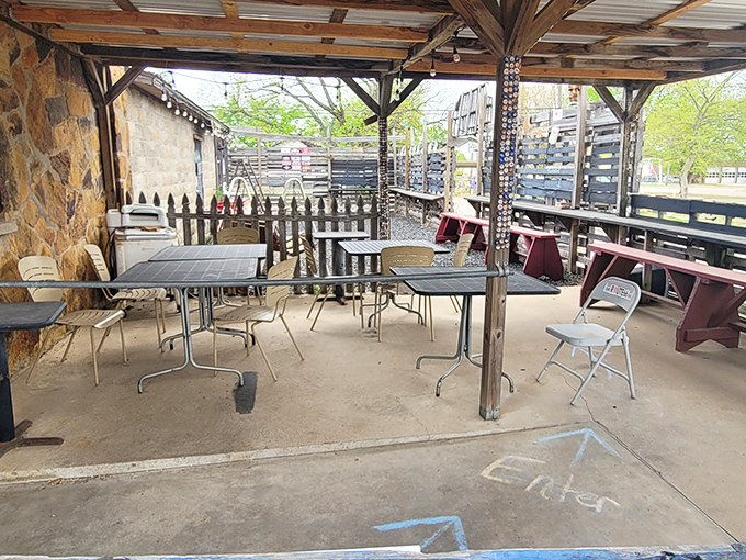 The outdoor seating area whispers, "Take your time, the highway's been here for decades and isn't going anywhere without you."